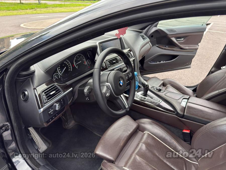 Black BMW 6 Series 2012 in Tallinn, with an engine capacity of 3.00 L and mileage of 422 thousand km for 18000 €, photo 10 on AUTOMOTO.COM.LV