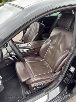 Black BMW 6 Series 2012 in Tallinn, with an engine capacity of 3.00 L and mileage of 422 thousand km for 18000 €, photo 11 on AUTOMOTO.COM.LV