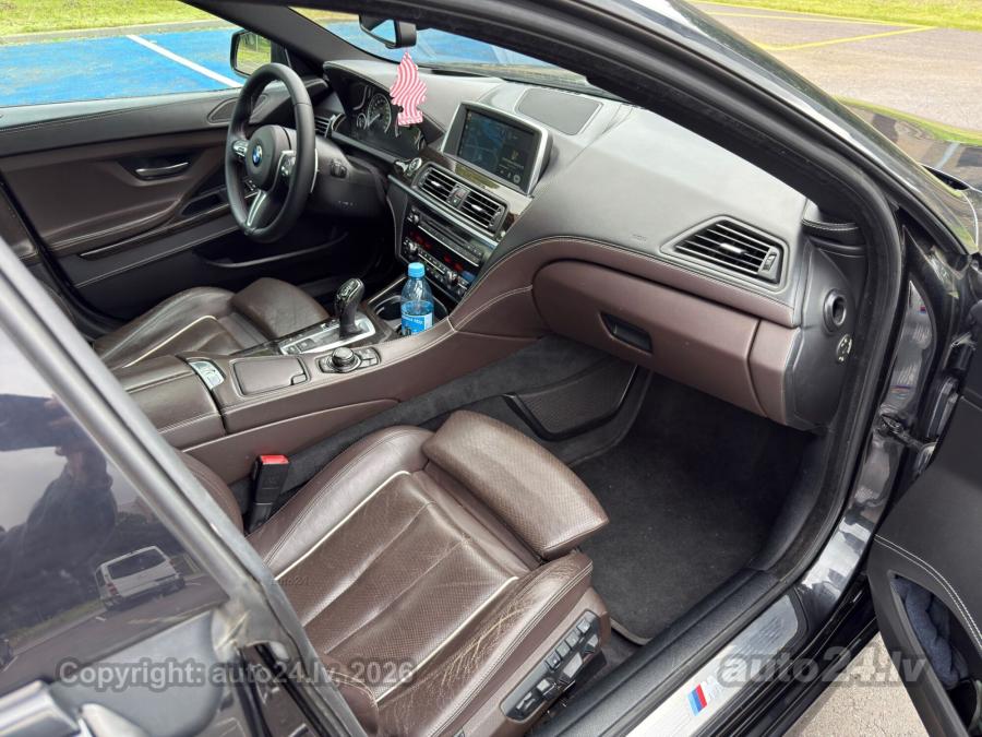 Black BMW 6 Series 2012 in Tallinn, with an engine capacity of 3.00 L and mileage of 422 thousand km for 18000 €, photo 12 on AUTOMOTO.COM.LV
