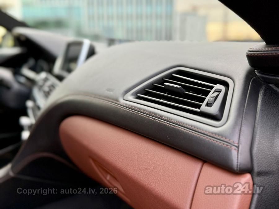 Melns BMW 6 Series 2012 Tallina, ar dzinēja tilpumu 3.00 L un nobraukumu 350 tūkst. km par 16900 €, foto 21 vietnē AUTOMOTO.COM.LV