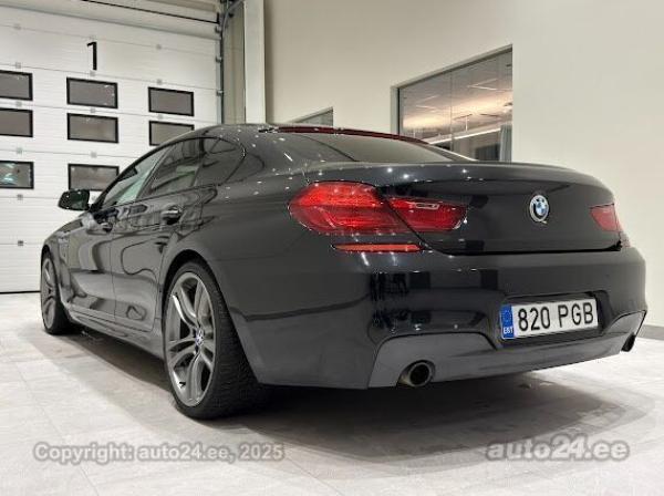 Black BMW 6 Series 2013 in Tallinn, with an engine capacity of 3.00 L and mileage of 207 thousand km for 18900 €, photo 3 on AUTOMOTO.COM.LV