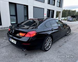 Black BMW 6 Series 2013 in Tartu, with an engine capacity of 3.00 L and mileage of 260 thousand km for 17499 €, photo 4 on AUTOMOTO.COM.LV