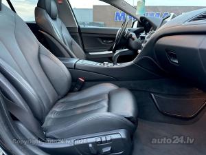 Black BMW 6 Series 2013 in Tartu, with an engine capacity of 3.00 L and mileage of 260 thousand km for 17499 €, photo 7 on AUTOMOTO.COM.LV