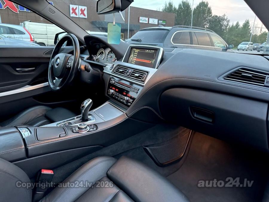 Black BMW 6 Series 2013 in Tartu, with an engine capacity of 3.00 L and mileage of 260 thousand km for 17499 €, photo 8 on AUTOMOTO.COM.LV