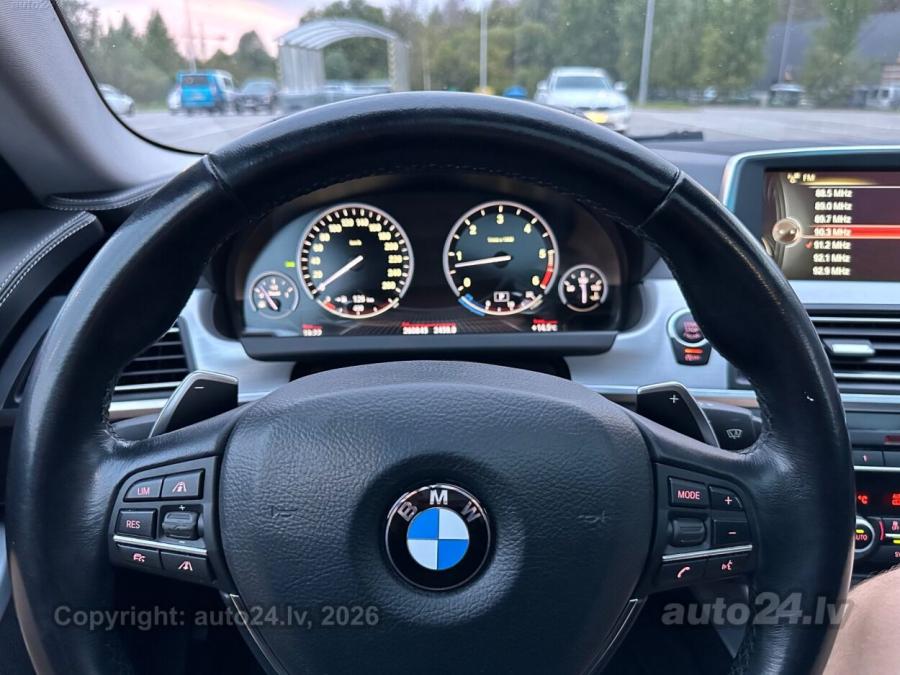 Black BMW 6 Series 2013 in Tartu, with an engine capacity of 3.00 L and mileage of 260 thousand km for 17499 €, photo 17 on AUTOMOTO.COM.LV