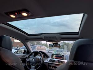 Black BMW 6 Series 2013 in Tartu, with an engine capacity of 3.00 L and mileage of 260 thousand km for 17499 €, photo 20 on AUTOMOTO.COM.LV