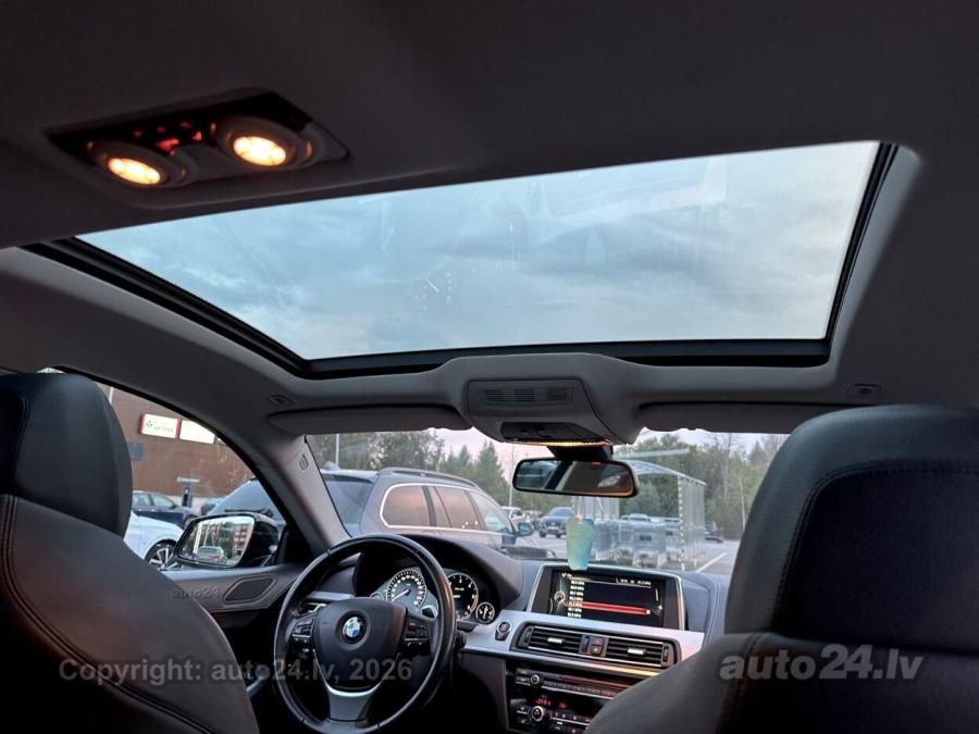 Black BMW 6 Series 2013 in Tartu, with an engine capacity of 3.00 L and mileage of 260 thousand km for 17499 €, photo 20 on AUTOMOTO.COM.LV