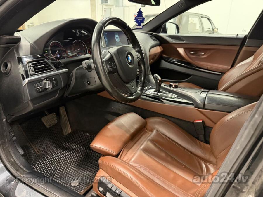 Melns BMW 6 Series 2013 Tallina, ar dzinēja tilpumu 3.00 L un nobraukumu 293 tūkst. km par 17999 €, foto 15 vietnē AUTOMOTO.COM.LV