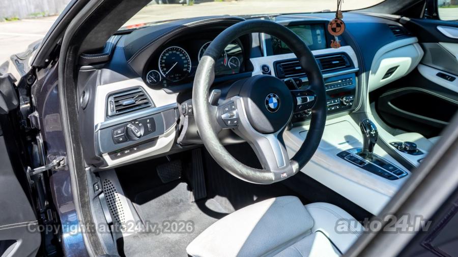 Melns BMW 6 Series 2013 Tallina, ar dzinēja tilpumu 3.00 L un nobraukumu 301 tūkst. km par 19900 €, foto 12 vietnē AUTOMOTO.COM.LV