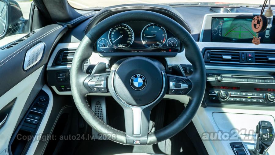Melns BMW 6 Series 2013 Tallina, ar dzinēja tilpumu 3.00 L un nobraukumu 301 tūkst. km par 19900 €, foto 27 vietnē AUTOMOTO.COM.LV