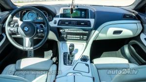 Melns BMW 6 Series 2013 Tallina, ar dzinēja tilpumu 3.00 L un nobraukumu 301 tūkst. km par 19900 €, foto 28 vietnē AUTOMOTO.COM.LV