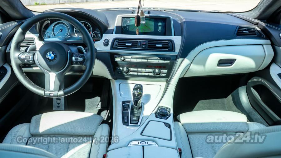 Melns BMW 6 Series 2013 Tallina, ar dzinēja tilpumu 3.00 L un nobraukumu 301 tūkst. km par 19900 €, foto 28 vietnē AUTOMOTO.COM.LV