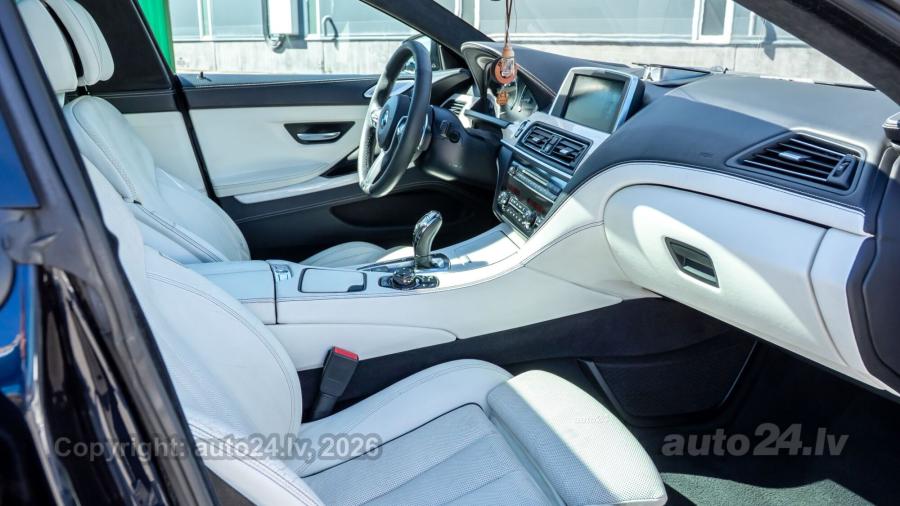 Melns BMW 6 Series 2013 Tallina, ar dzinēja tilpumu 3.00 L un nobraukumu 301 tūkst. km par 19900 €, foto 29 vietnē AUTOMOTO.COM.LV