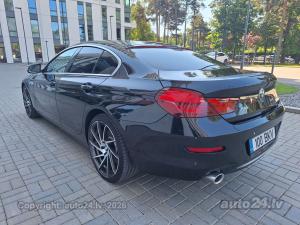 Black BMW 6 Series 2015 in Tallinn, with an engine capacity of 3.00 L and mileage of 189 thousand km for 18500 €, photo 5 on AUTOMOTO.COM.LV