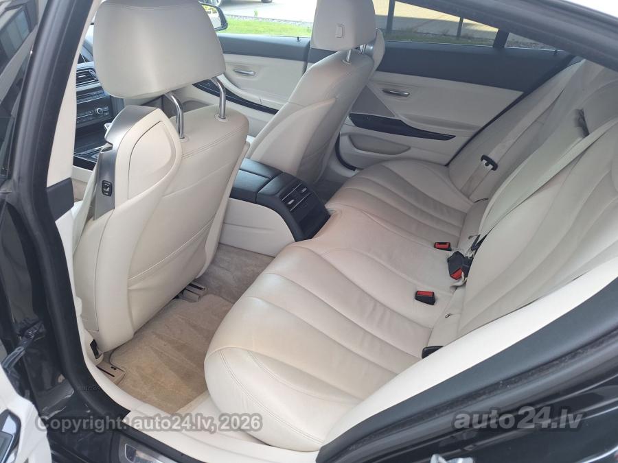 Black BMW 6 Series 2015 in Tallinn, with an engine capacity of 3.00 L and mileage of 189 thousand km for 18500 €, photo 8 on AUTOMOTO.COM.LV