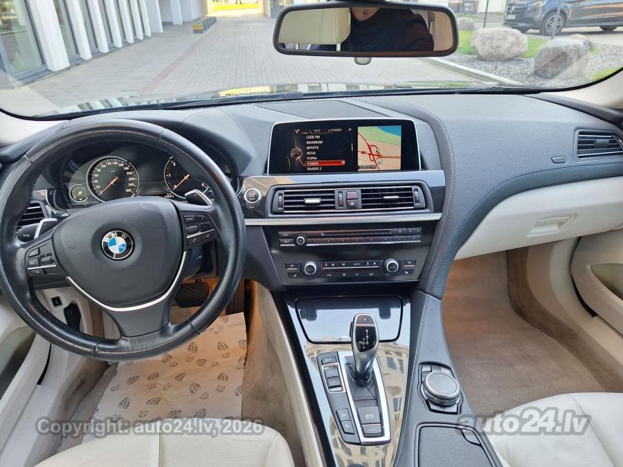 Black BMW 6 Series 2015 in Tallinn, with an engine capacity of 3.00 L and mileage of 189 thousand km for 18500 €, photo 15 on AUTOMOTO.COM.LV