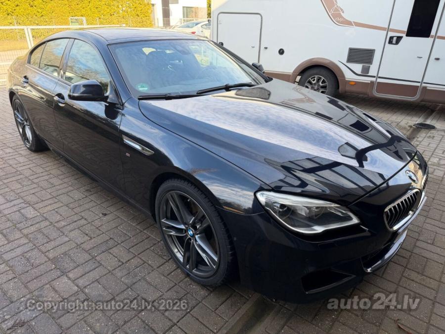 Black BMW 6 Series 2016 in Tallinn, with an engine capacity of 3.00 L and mileage of 250 thousand km for 23999 €, photo 7 on AUTOMOTO.COM.LV