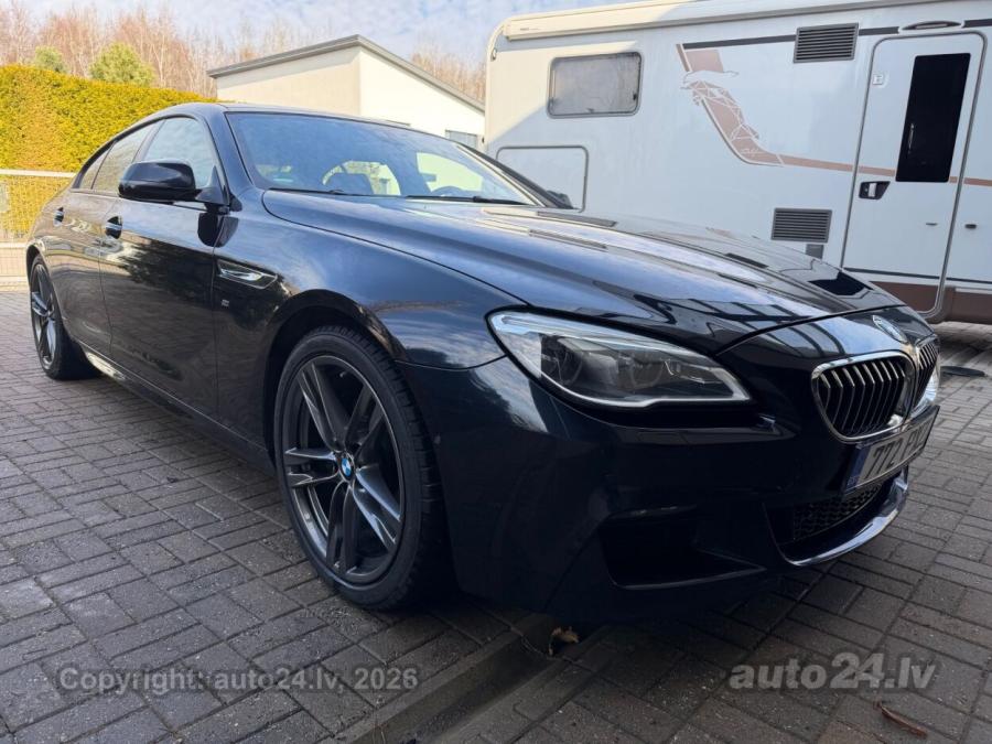 Black BMW 6 Series 2016 in Tallinn, with an engine capacity of 3.00 L and mileage of 250 thousand km for 23999 €, photo 8 on AUTOMOTO.COM.LV
