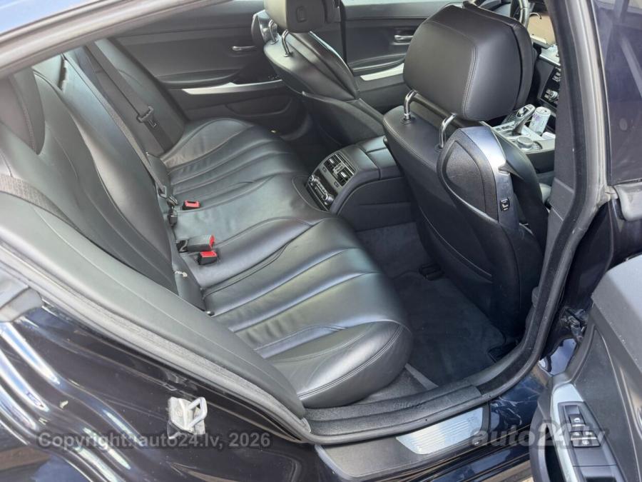 Black BMW 6 Series 2016 in Tallinn, with an engine capacity of 3.00 L and mileage of 250 thousand km for 23999 €, photo 10 on AUTOMOTO.COM.LV