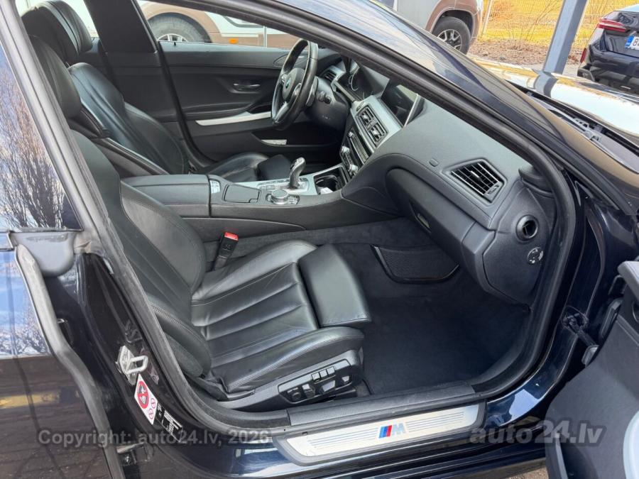 Black BMW 6 Series 2016 in Tallinn, with an engine capacity of 3.00 L and mileage of 250 thousand km for 23999 €, photo 12 on AUTOMOTO.COM.LV