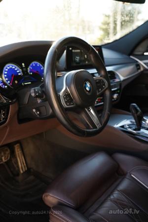 Black BMW 6 Series 2018 in Tallinn, with an engine capacity of 3.00 L and mileage of 161 thousand km for 31499 €, photo 6 on AUTOMOTO.COM.LV