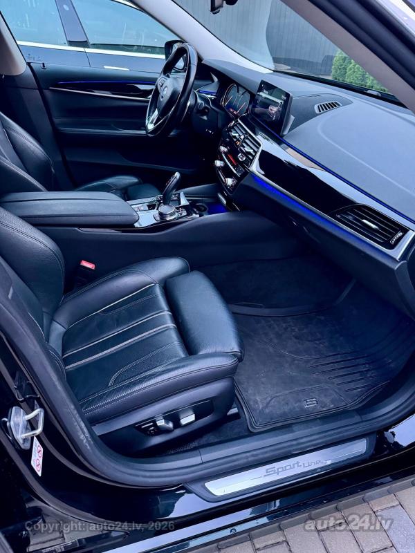 Black BMW 6 Series 2018 in Tallinn, with an engine capacity of 3.00 L and mileage of 171 thousand km for 23500 €, photo 8 on AUTOMOTO.COM.LV