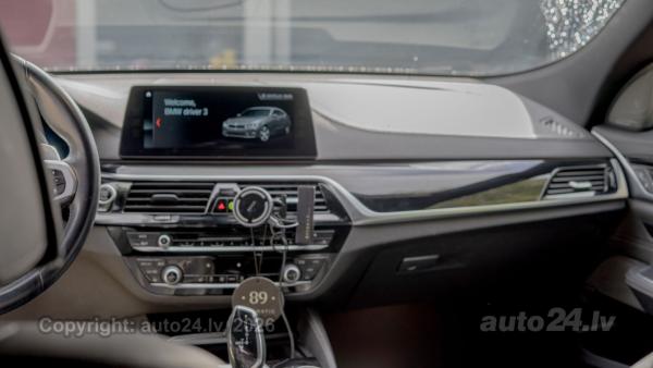 Black BMW 6 Series 2018 in Tallinn, with an engine capacity of 3.00 L and mileage of 168 thousand km for 25900 €, photo 11 on AUTOMOTO.COM.LV