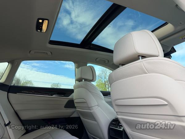 Red BMW 6 Series 2019 in Tallinn, with an engine capacity of 3.00 L and mileage of 143 thousand km for 28900 €, photo 9 on AUTOMOTO.COM.LV