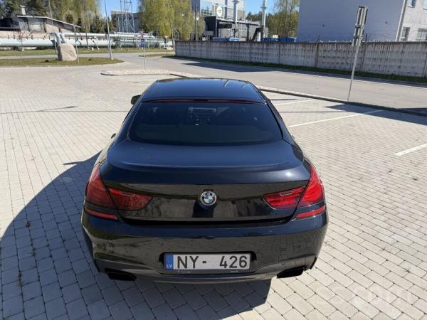 Black BMW 640 2012 in Riga, with an engine capacity of 3.00 L and mileage of 234 thousand km for 17990 €, photo 5 on AUTOMOTO.COM.LV