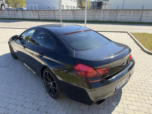 Black BMW 640 2012 in Riga, with an engine capacity of 3.00 L and mileage of 234 thousand km for 17990 €, photo 6 on AUTOMOTO.COM.LV
