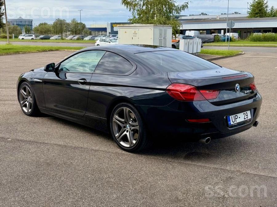 Black BMW 640 2012 in Riga, with an engine capacity of 3.00 L and mileage of 162 thousand km for 16900 €, photo 6 on AUTOMOTO.COM.LV