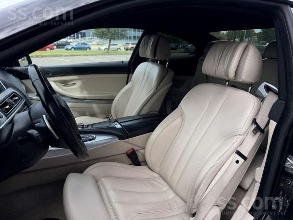 Black BMW 640 2012 in Riga, with an engine capacity of 3.00 L and mileage of 162 thousand km for 16900 €, photo 10 on AUTOMOTO.COM.LV