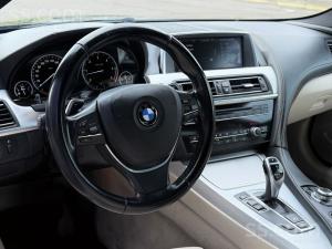 Black BMW 640 2012 in Riga, with an engine capacity of 3.00 L and mileage of 162 thousand km for 16900 €, photo 11 on AUTOMOTO.COM.LV