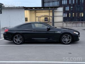 Black BMW 640 2012 in Riga, with an engine capacity of 3.00 L and mileage of 162 thousand km for 16900 €, photo 23 on AUTOMOTO.COM.LV