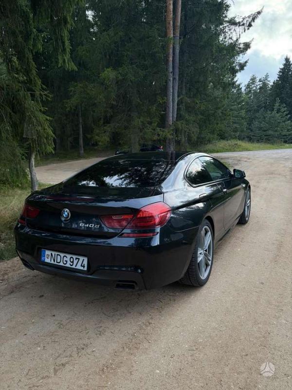 Black BMW 640 2014 in Telschi, with an engine capacity of 2.99 L and mileage of 201 thousand km for 14850 €, photo 5 on AUTOMOTO.COM.LV