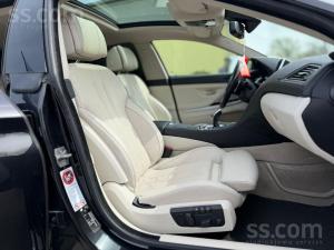 Black BMW 640 2012 in Kuldiga, with an engine capacity of 3.00 L and mileage of 163 thousand km for 18000 €, photo 18 on AUTOMOTO.COM.LV