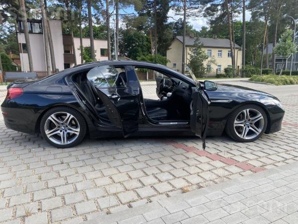 Black BMW 640 2013 in Riga, with an engine capacity of 3.00 L and mileage of 288 thousand km for 13500 €, photo 5 on AUTOMOTO.COM.LV