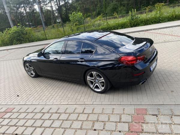 Black BMW 640 2013 in Riga, with an engine capacity of 3.00 L and mileage of 288 thousand km for 13500 €, photo 9 on AUTOMOTO.COM.LV