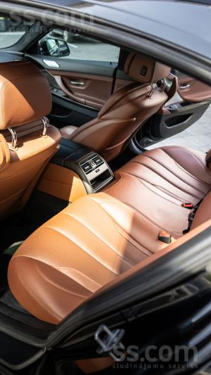 Black BMW 640 2013 in Riga, with an engine capacity of 3.00 L and mileage of 191 thousand km for 19800 €, photo 11 on AUTOMOTO.COM.LV