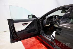 Black BMW 640 2015 in Riga, with an engine capacity of 3.00 L and mileage of 232 thousand km for 27300 €, photo 8 on AUTOMOTO.COM.LV