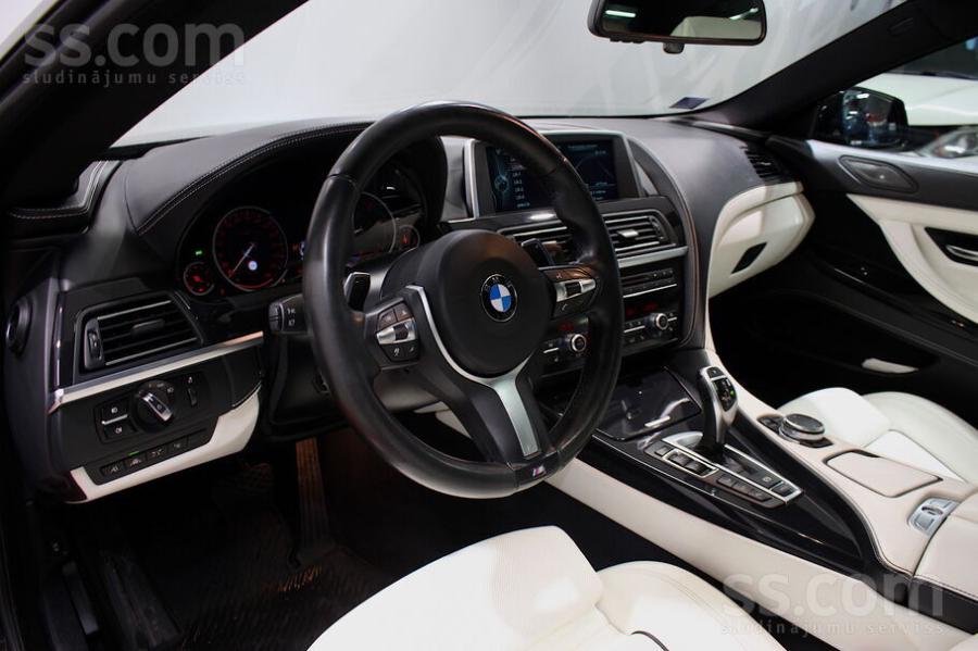 Black BMW 640 2015 in Riga, with an engine capacity of 3.00 L and mileage of 232 thousand km for 27300 €, photo 12 on AUTOMOTO.COM.LV