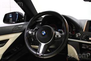 Black BMW 640 2015 in Riga, with an engine capacity of 3.00 L and mileage of 232 thousand km for 27300 €, photo 33 on AUTOMOTO.COM.LV