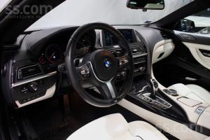 Black BMW 640 2015 in Riga, with an engine capacity of 3.00 L and mileage of 232 thousand km for 27300 €, photo 12 on AUTOMOTO.COM.LV