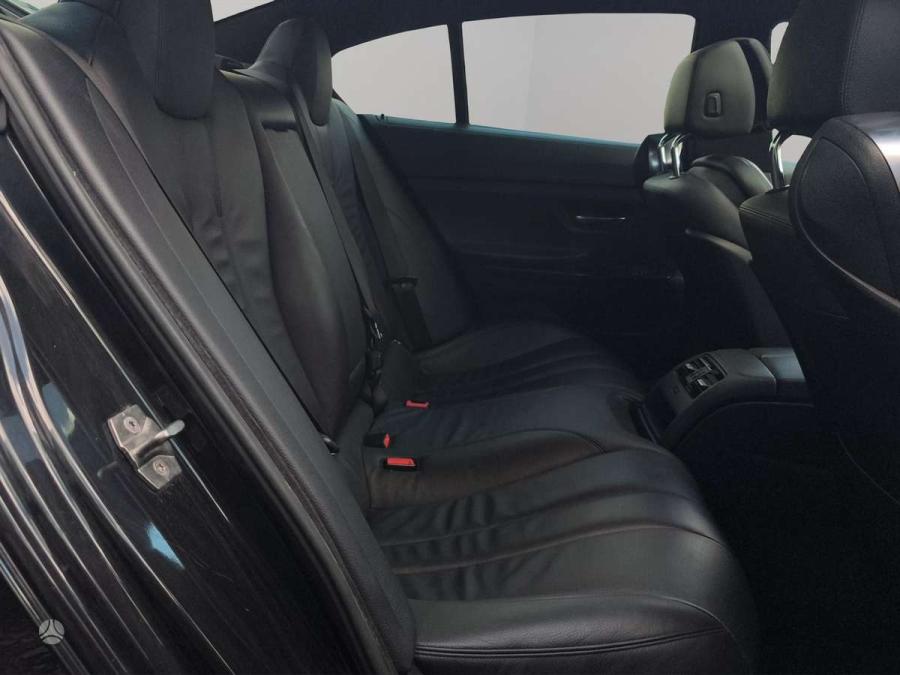 Black BMW 640 Gran Coupe 2012 in Vilnius, with an engine capacity of 3.00 L and mileage of 235 thousand km for 14999 €, photo 11 on AUTOMOTO.COM.LV