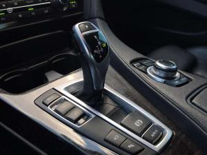 Black BMW 640 Gran Coupe 2012 in Vilnius, with an engine capacity of 3.00 L and mileage of 235 thousand km for 14999 €, photo 19 on AUTOMOTO.COM.LV