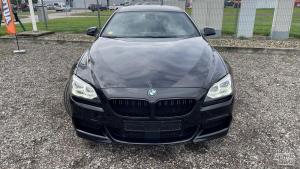 Black BMW 640 Gran Coupe 2012 in Marijampole, with an engine capacity of 3.00 L and mileage of 234 thousand km for 16990 €, photo 7 on AUTOMOTO.COM.LV