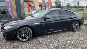 Black BMW 640 Gran Coupe 2012 in Marijampole, with an engine capacity of 3.00 L and mileage of 234 thousand km for 16990 €, photo 11 on AUTOMOTO.COM.LV