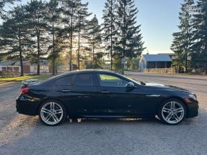 Black BMW 640 Gran Coupe 2015 in Birzai, with an engine capacity of 3.00 L and mileage of 195 thousand km for 17000 €, photo 6 on AUTOMOTO.COM.LV