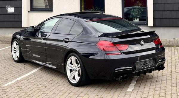 Black BMW 640 Gran Coupe 2013 in Kaunas, with an engine capacity of 3.00 L and mileage of 313 thousand km for 13990 €, photo 4 on AUTOMOTO.COM.LV