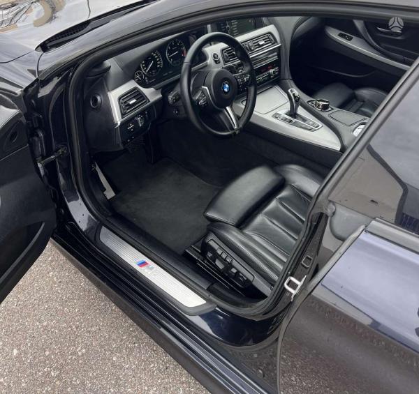 Black BMW 640 Gran Coupe 2013 in Kaunas, with an engine capacity of 3.00 L and mileage of 313 thousand km for 13990 €, photo 6 on AUTOMOTO.COM.LV
